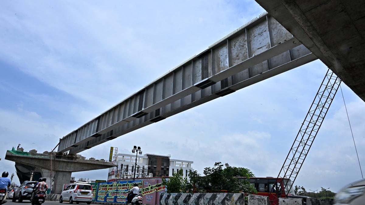 Highways Department placing steel girders at Hope College for Avinashi Road flyover in ...